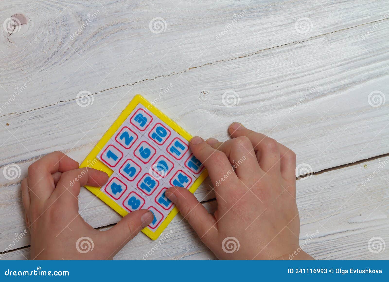 The Child Plays a Math Game with Numbers Tag, Puts the Numbers in the ...