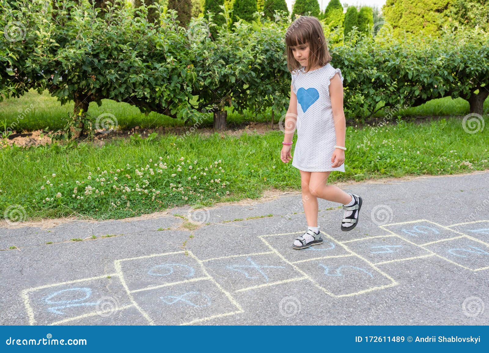 The Child Plays on the Pavement in Childrens Games Stock Image - Image ...