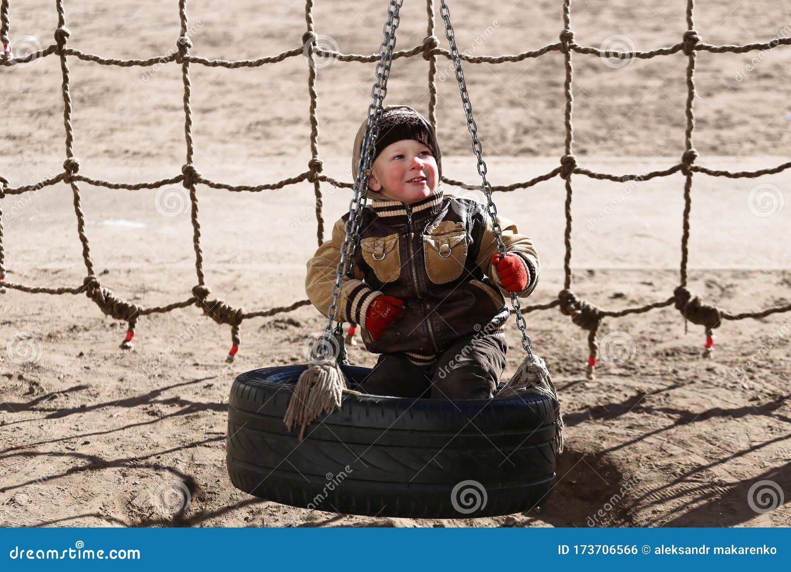 Child Plays in the Playground in Spring Stock Photo - Image of ...