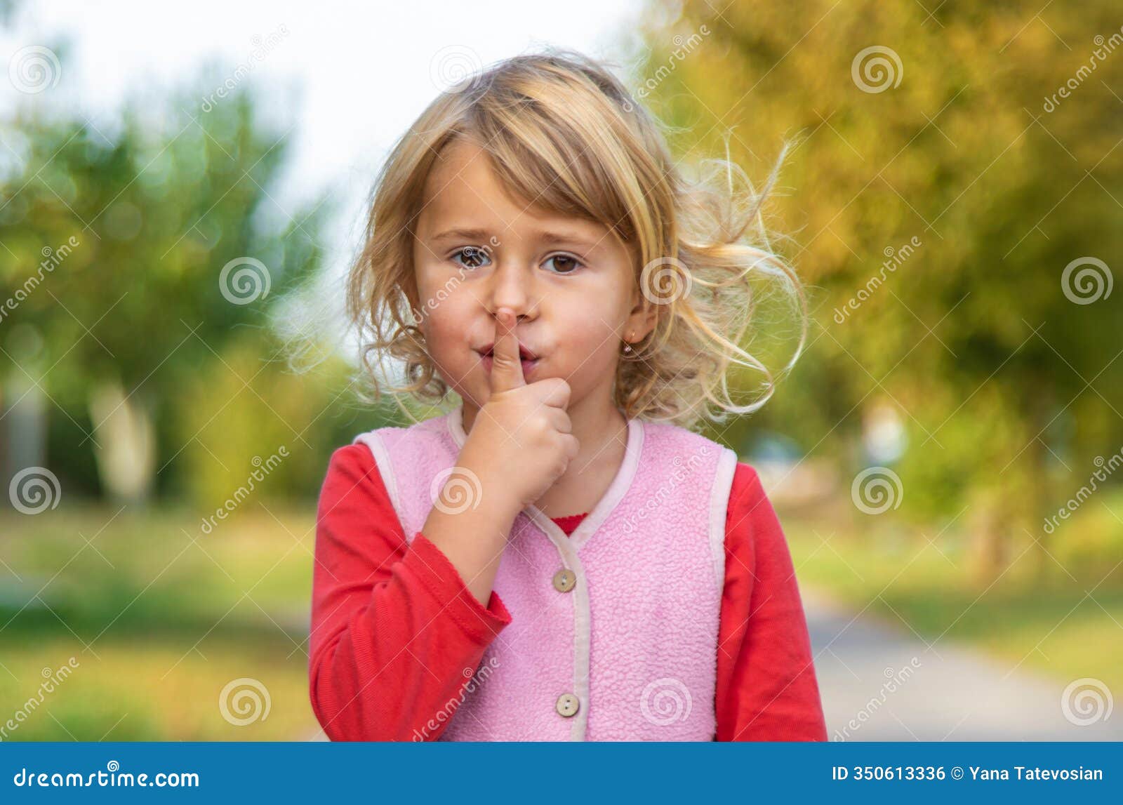 Child Pointing Quietly on the Street. Selective Focus Stock Photo ...