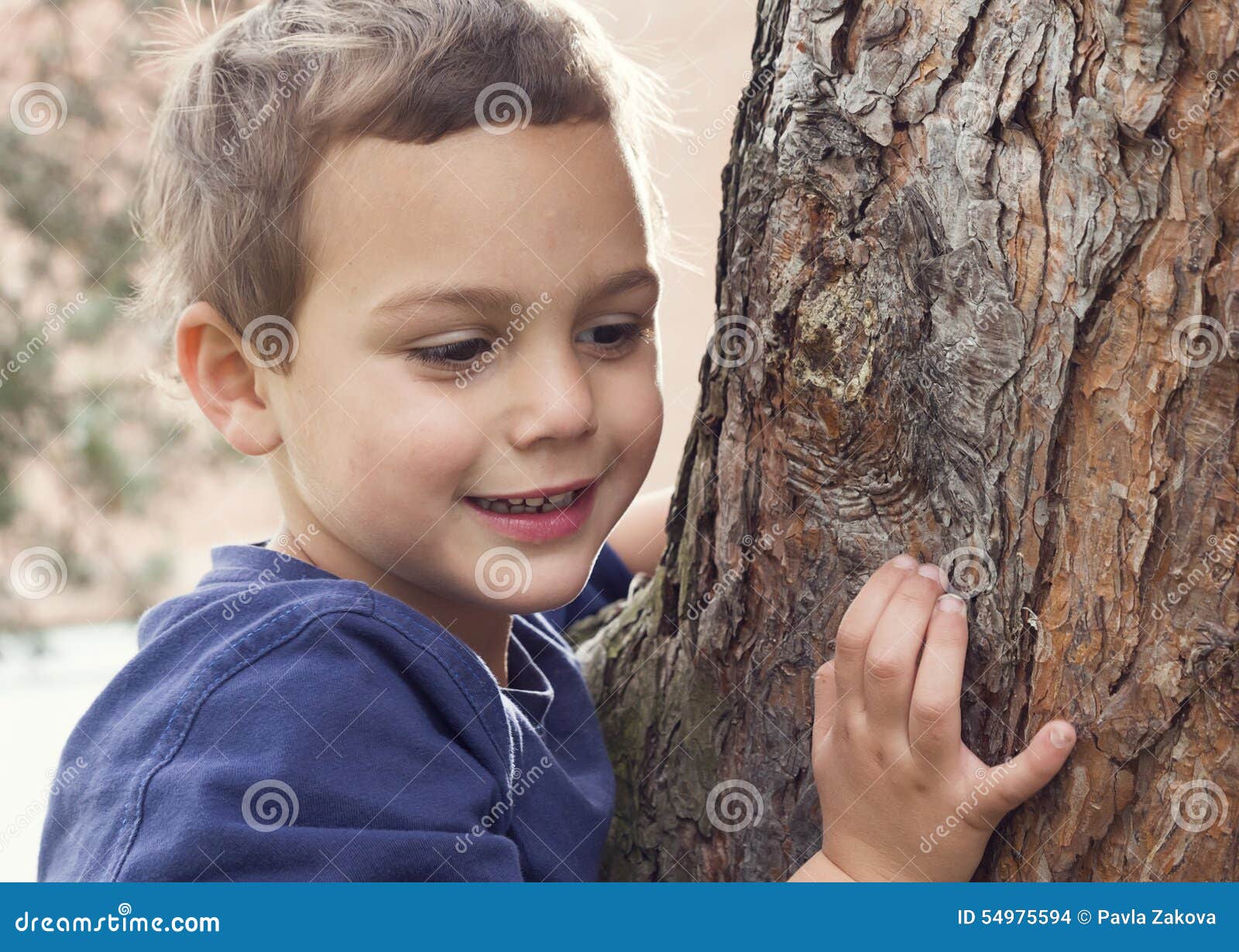 Child portrait by tree stock photo. Image of happy, beautiful - 54975594