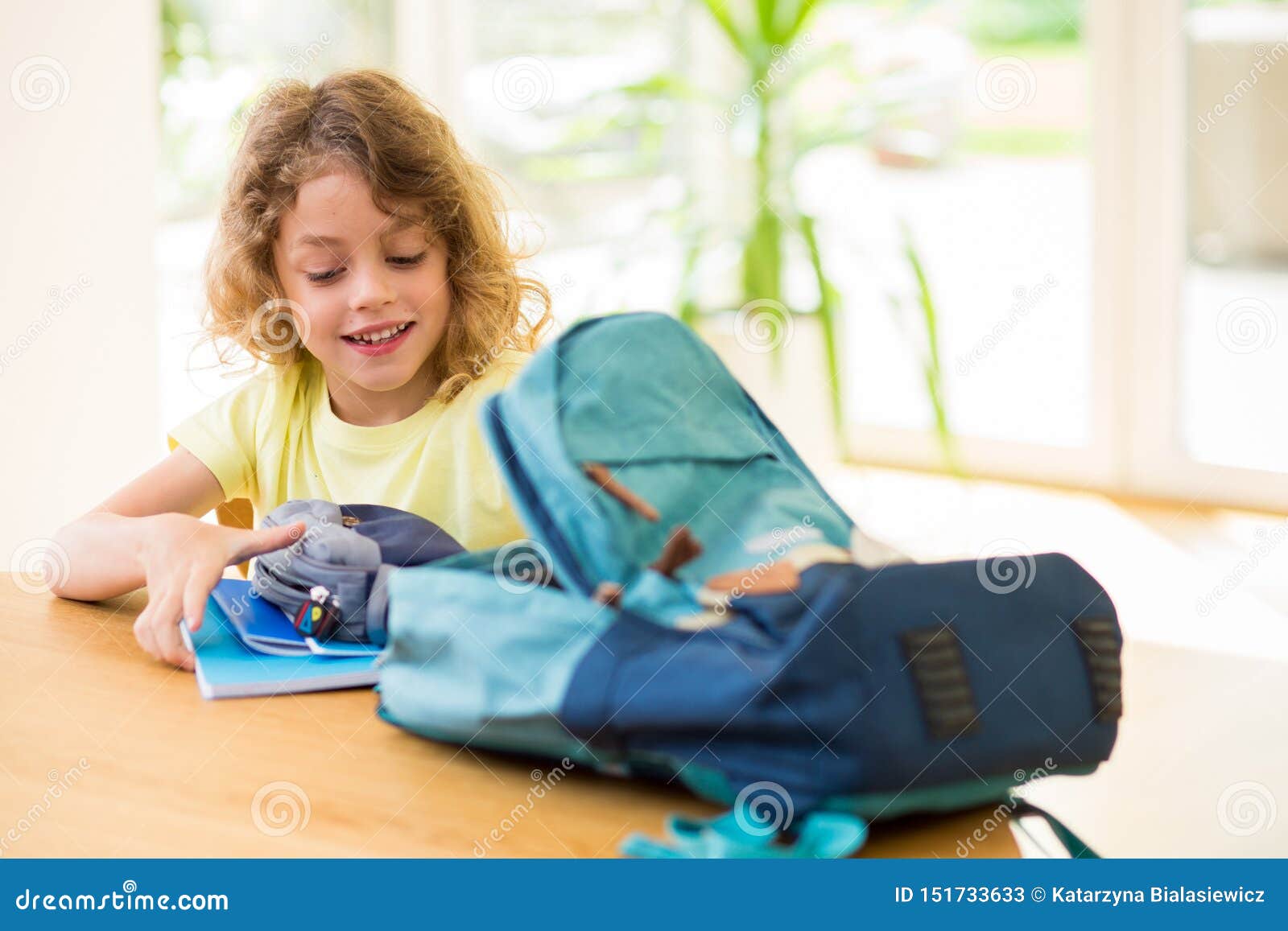 Child Preparing To Shool and Doing His Bag Stock Image - Image of ...
