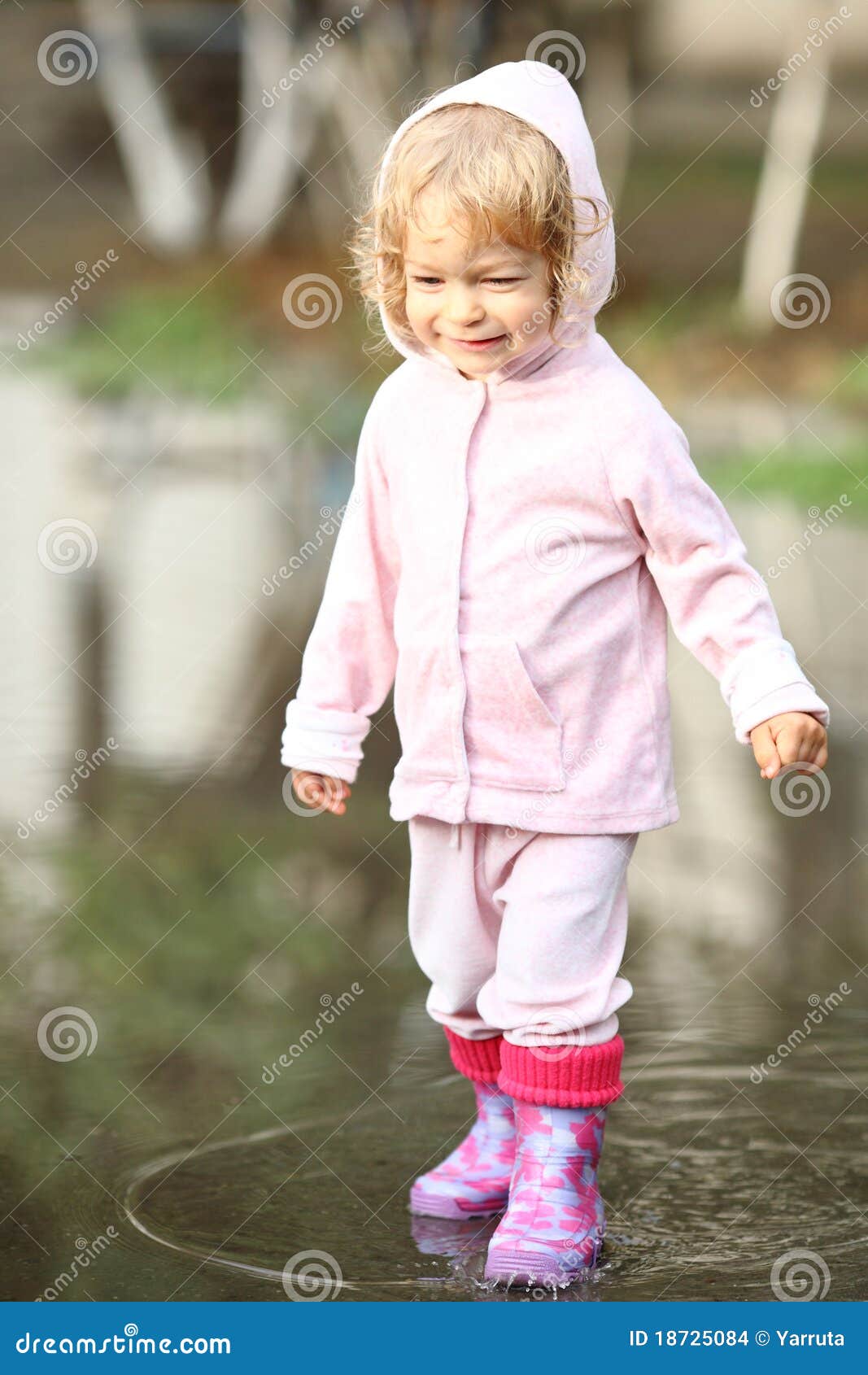 Child in puddle stock photo. Image of summertime, smiling - 18725084