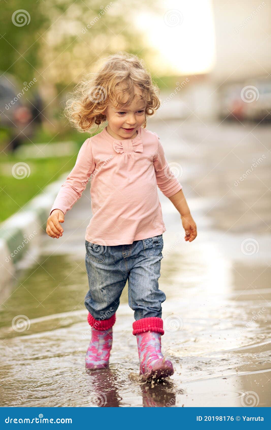 Child in puddle stock photo. Image of enjoyment, happiness - 20198176