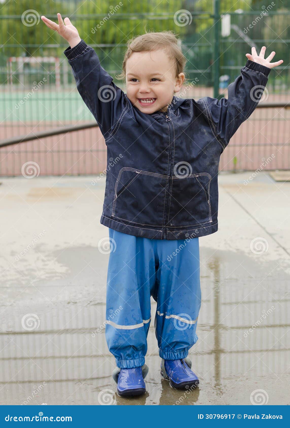 Child in puddle stock image. Image of splash, enjoyment - 30796917