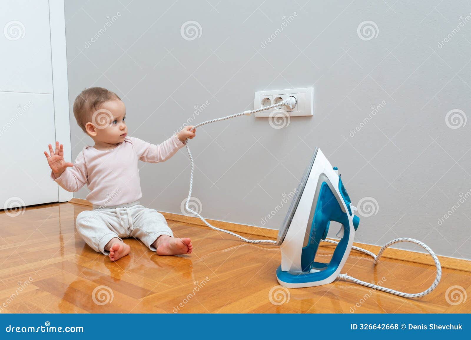 The Child Pulls the Electrical Plug Out of the Socket and Turns Off the ...