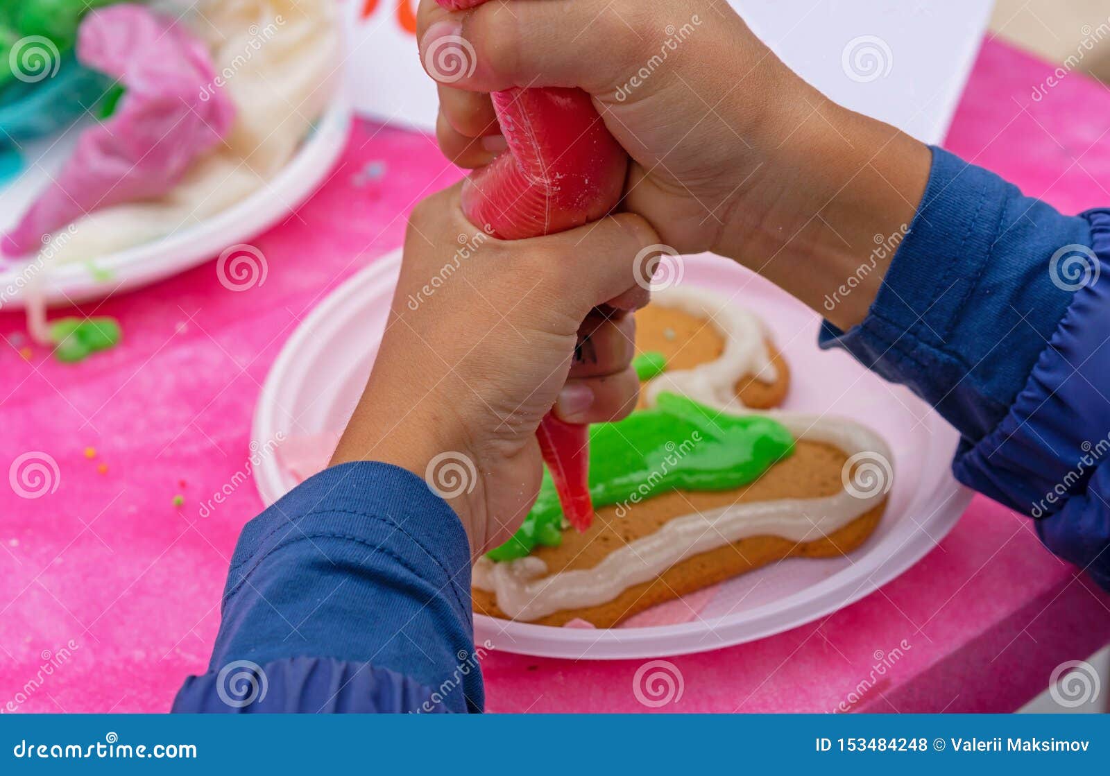 Child Puts the Cream on the Gingerbread. Master Class on Painting ...