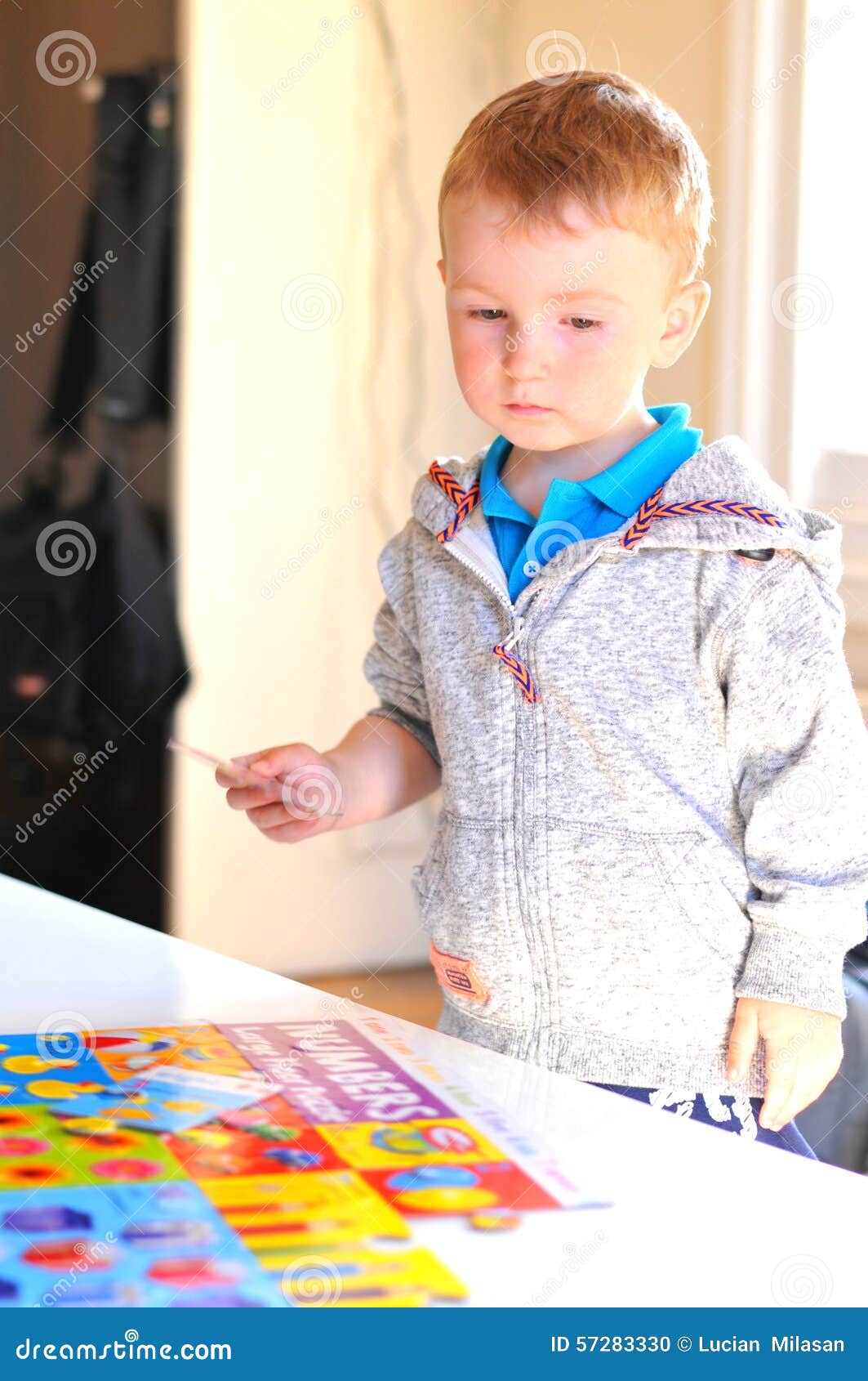 Child with puzzle stock photo. Image of pieces, educative - 57283330