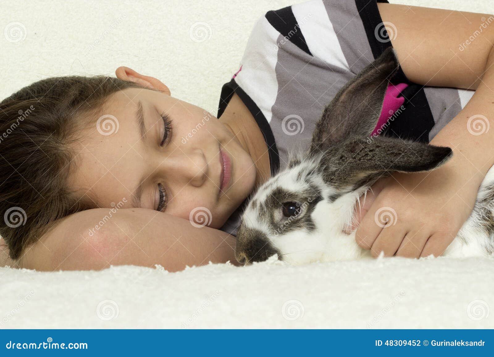 Child and rabbit stock photo. Image of embracing, beautiful - 48309452