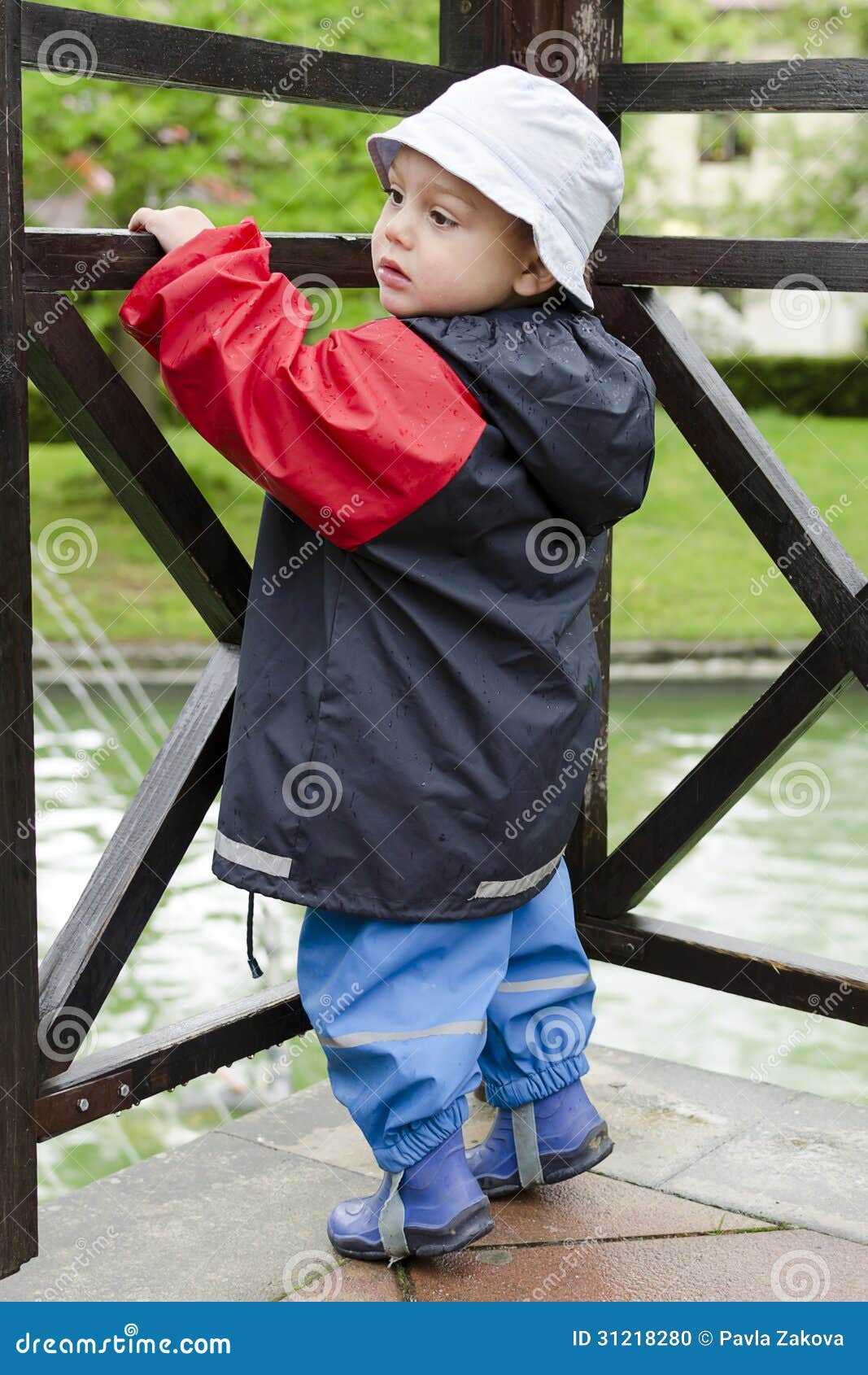 Child in rain stock photo. Image of rainy, season, park - 31218280