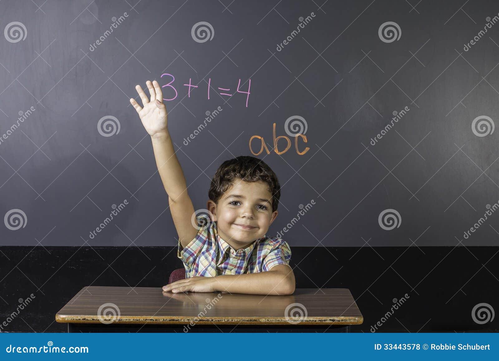 Child Raising Hand in Classroom. Stock Photo - Image of person ...