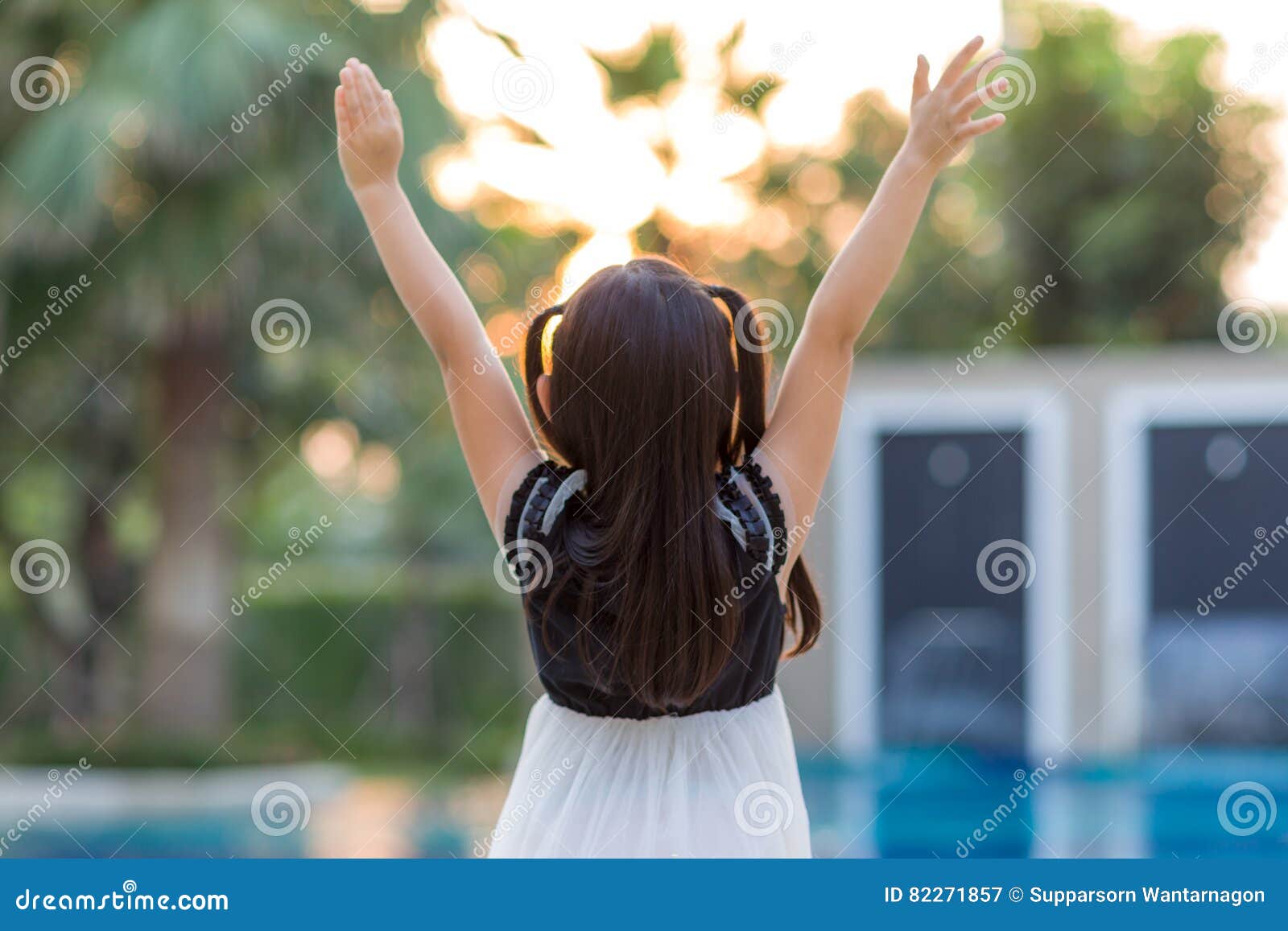 Child Raising Hands Facing Sun Stock Image - Image of little, child ...