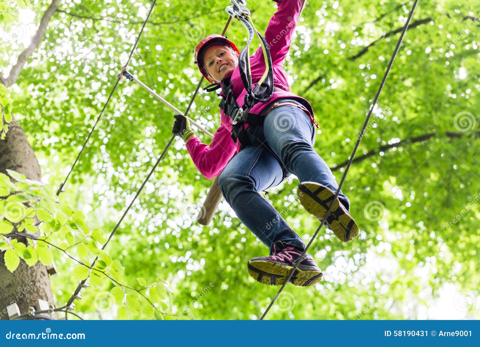 Child Reaching Platform Climbing in High Rope Course Stock Image ...
