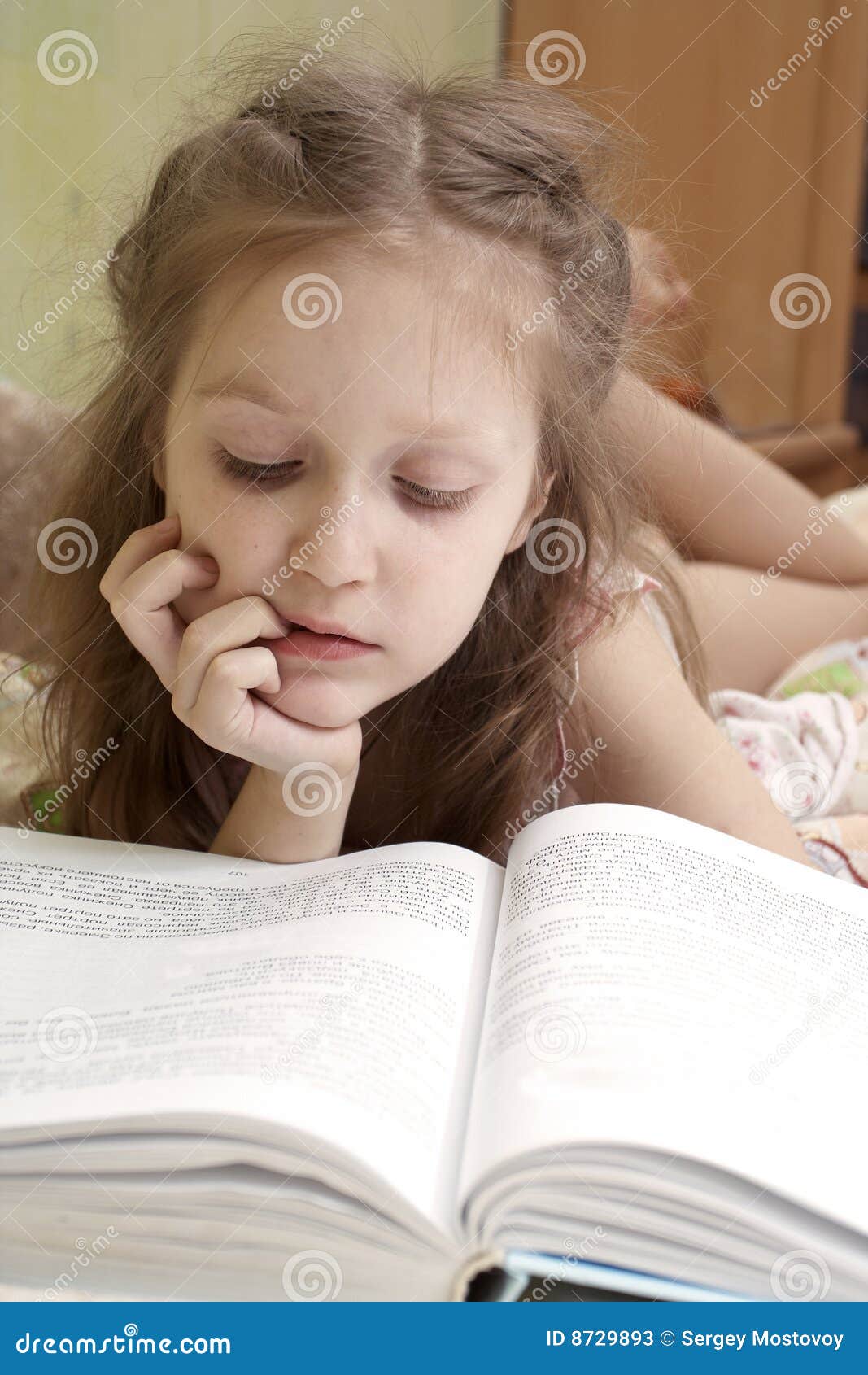 Child reading a book stock image. Image of book, face - 8729893
