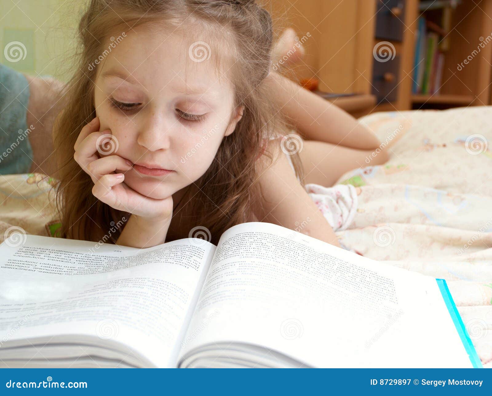 Child reading a book stock image. Image of intent, clever - 8729897