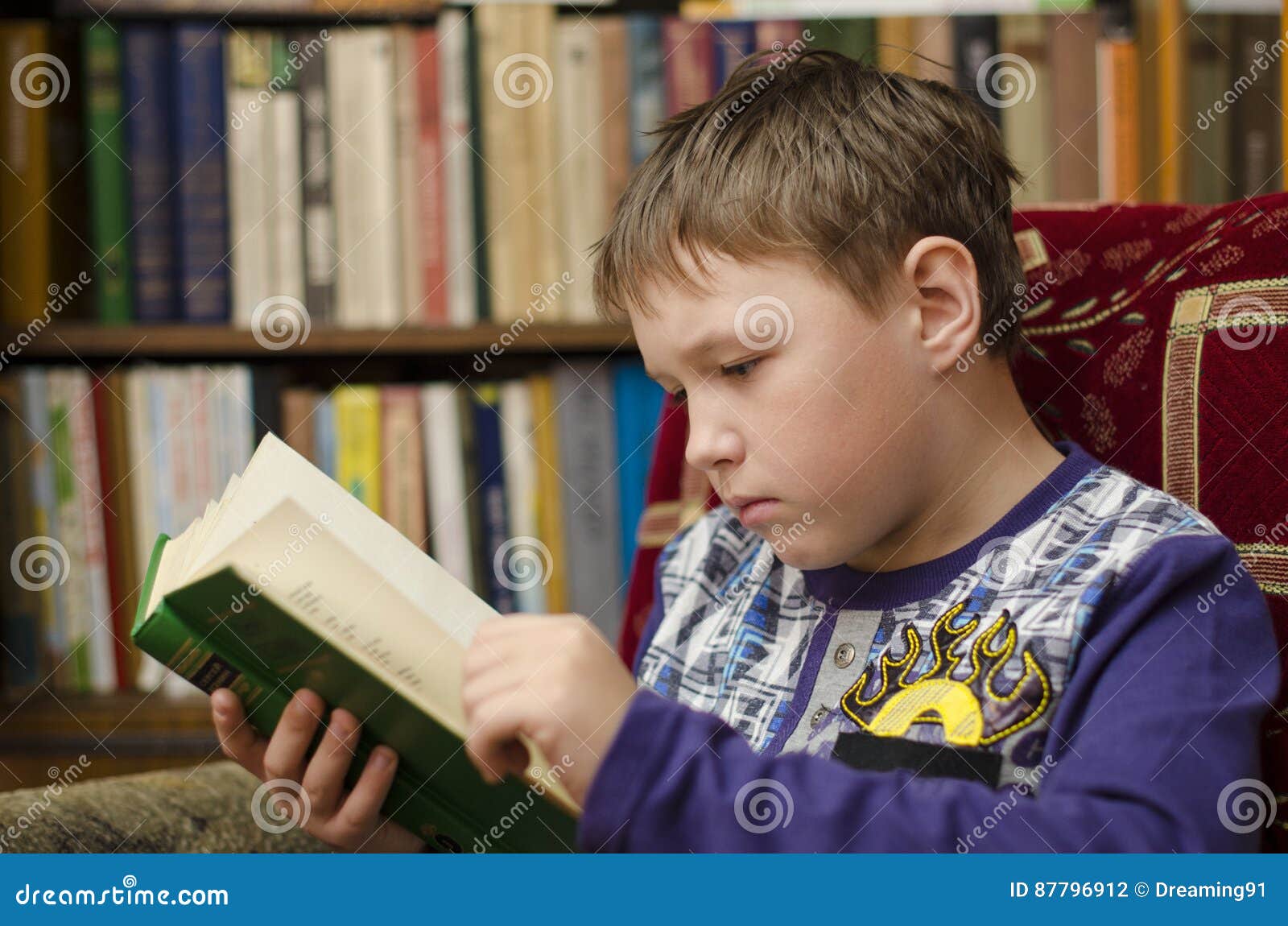 Child Reading Book at Home. Boy in Library Stock Photo - Image of ...