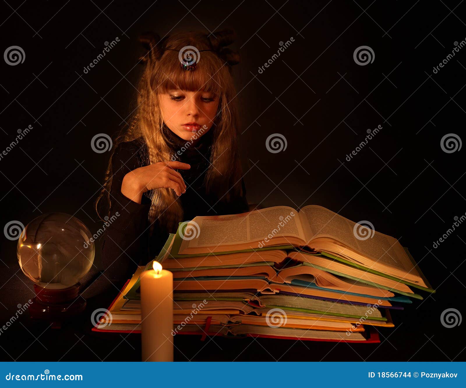 Child Reading Magic Book at Candle. Stock Photo - Image of forecast ...