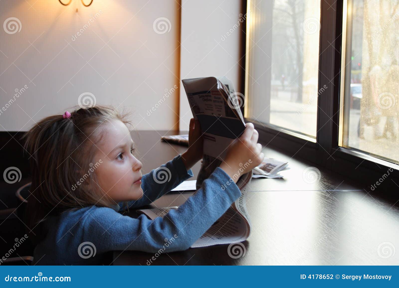 Child reading newspaper stock photo. Image of sitting - 4178652
