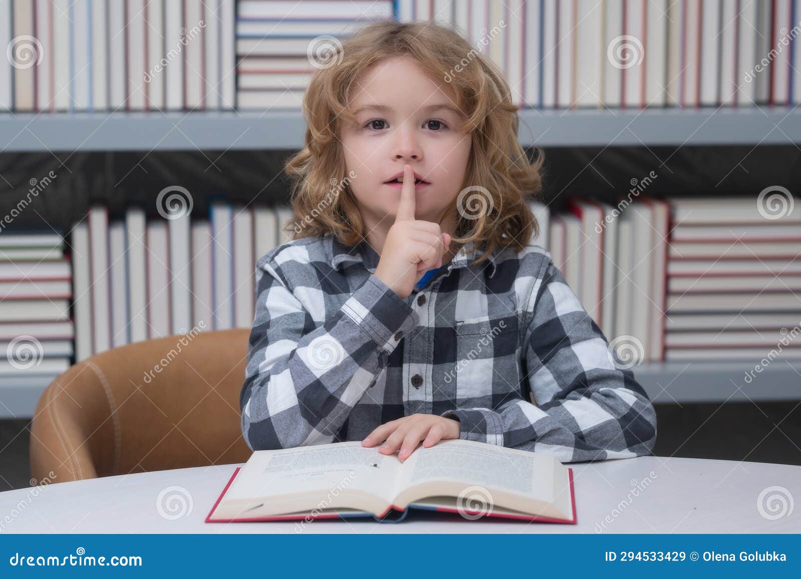 Child Reading a Red Book in the Library. Little Student on School ...
