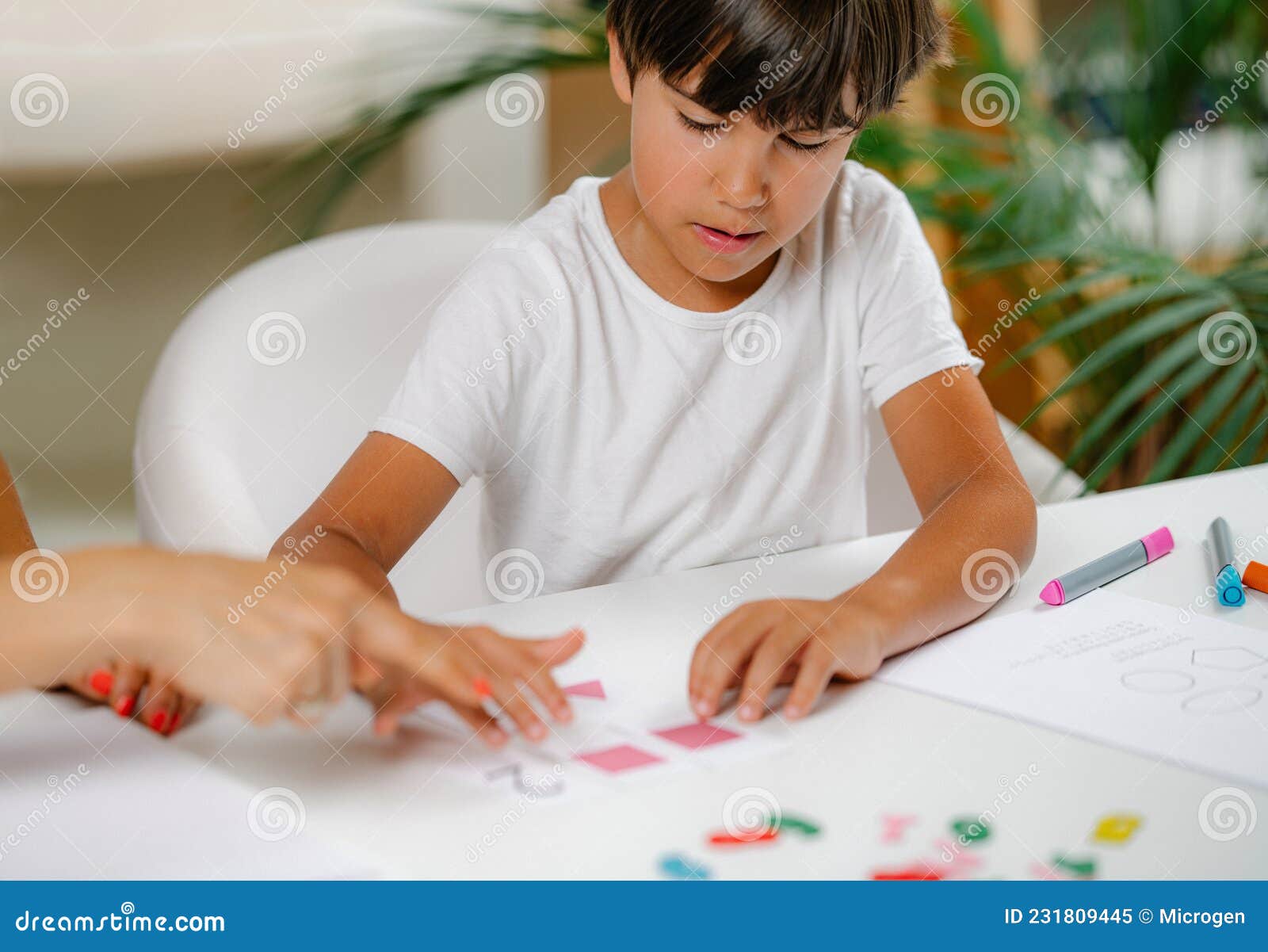 Child Recognizing Shapes in a Preschool Assessment Test Stock Image ...