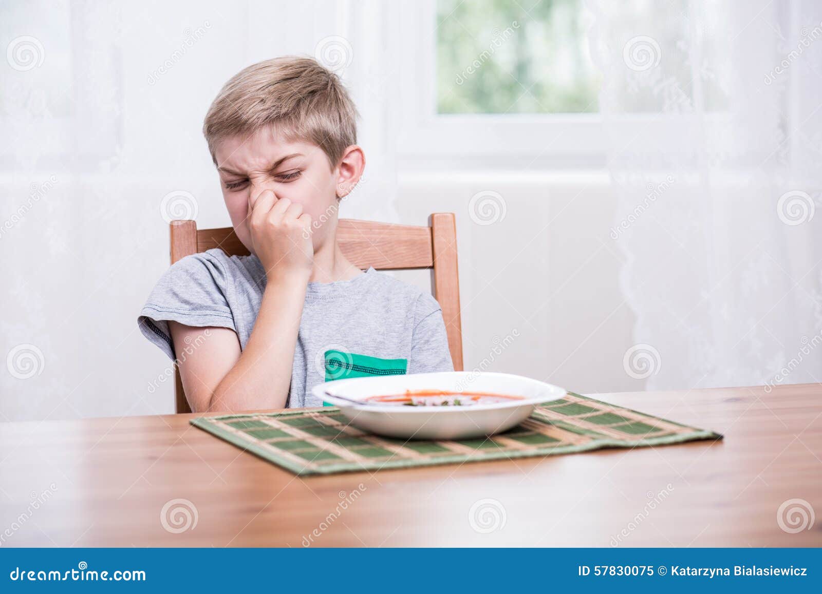 Child refusing to eat soup stock image. Image of plate - 57830075