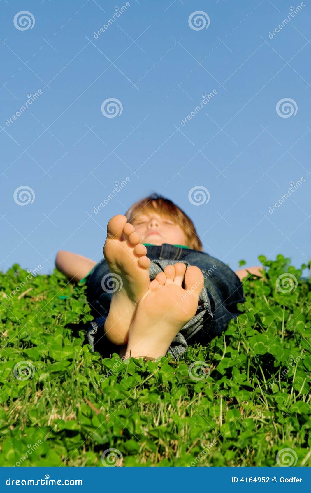 Child Relaxing Sleeping Outdoors Stock Photo - Image of feet ...