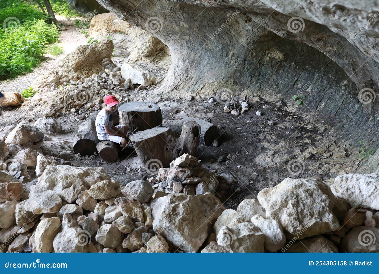 Child Resting in Grotto on Una-Koz Ridge Stock Photo - Image of ...