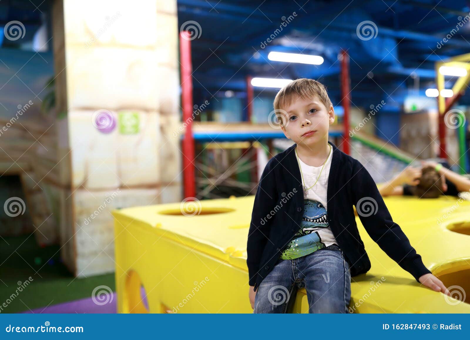 Child Resting on Playground Stock Image - Image of face, caucasian ...