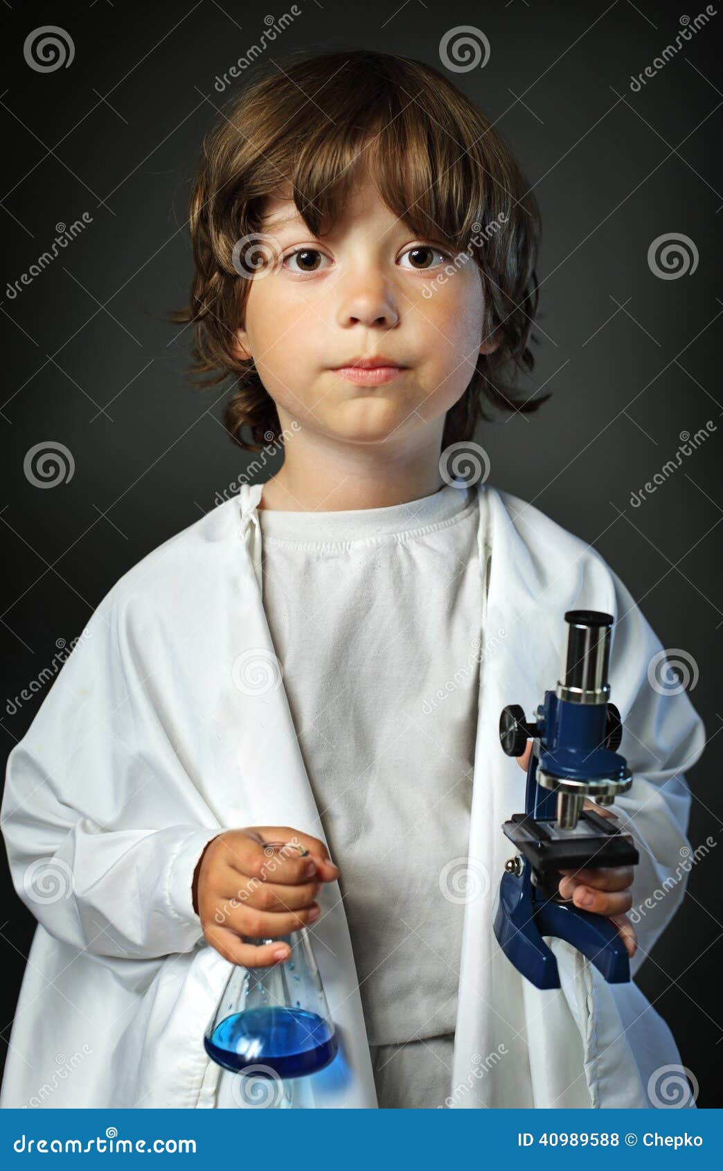 Child with Retort and Microscope Stock Photo - Image of boys, magnifier ...