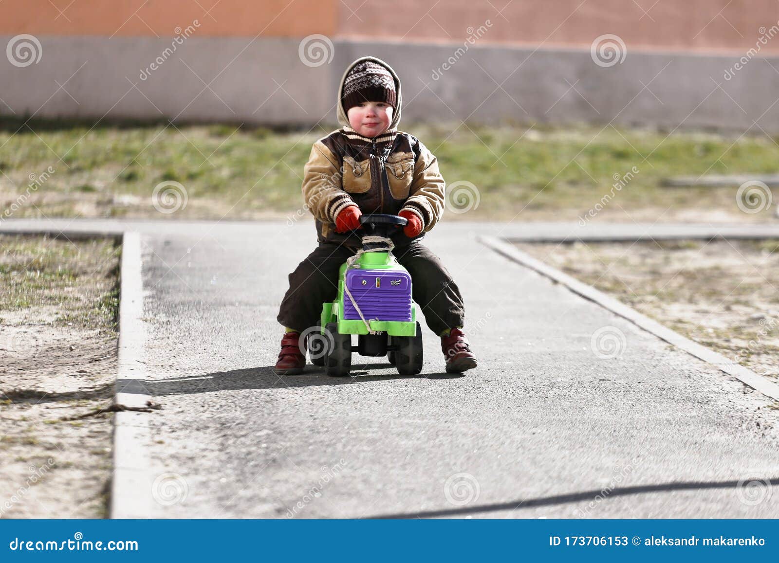 Child Rides a Toy Car in Spring Stock Image - Image of asian, girl ...