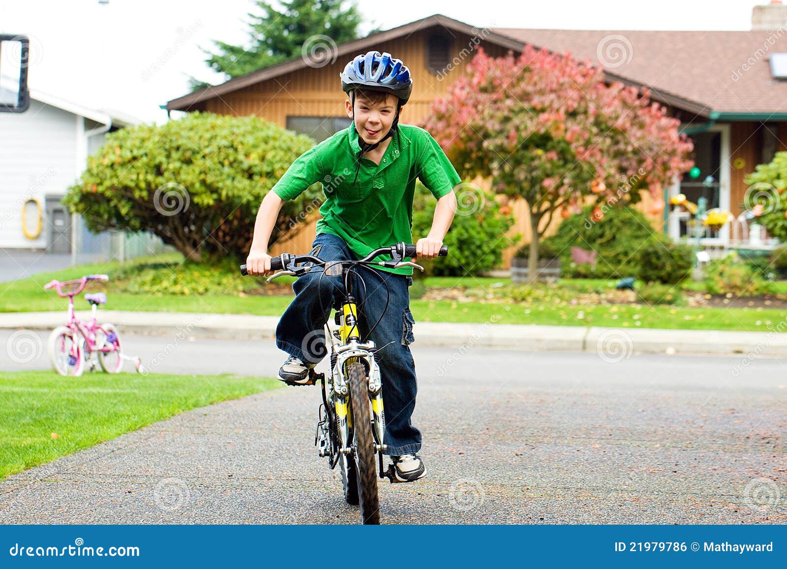 Child riding a bike stock photo. Image of outside, recreation - 21979786