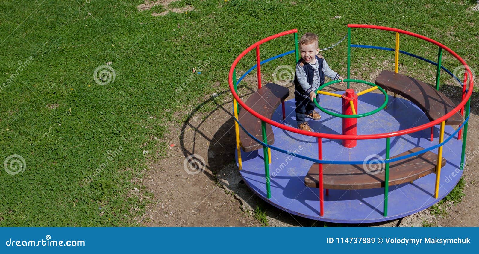 The Child is Riding a Carousel, a View from Above Stock Image - Image ...