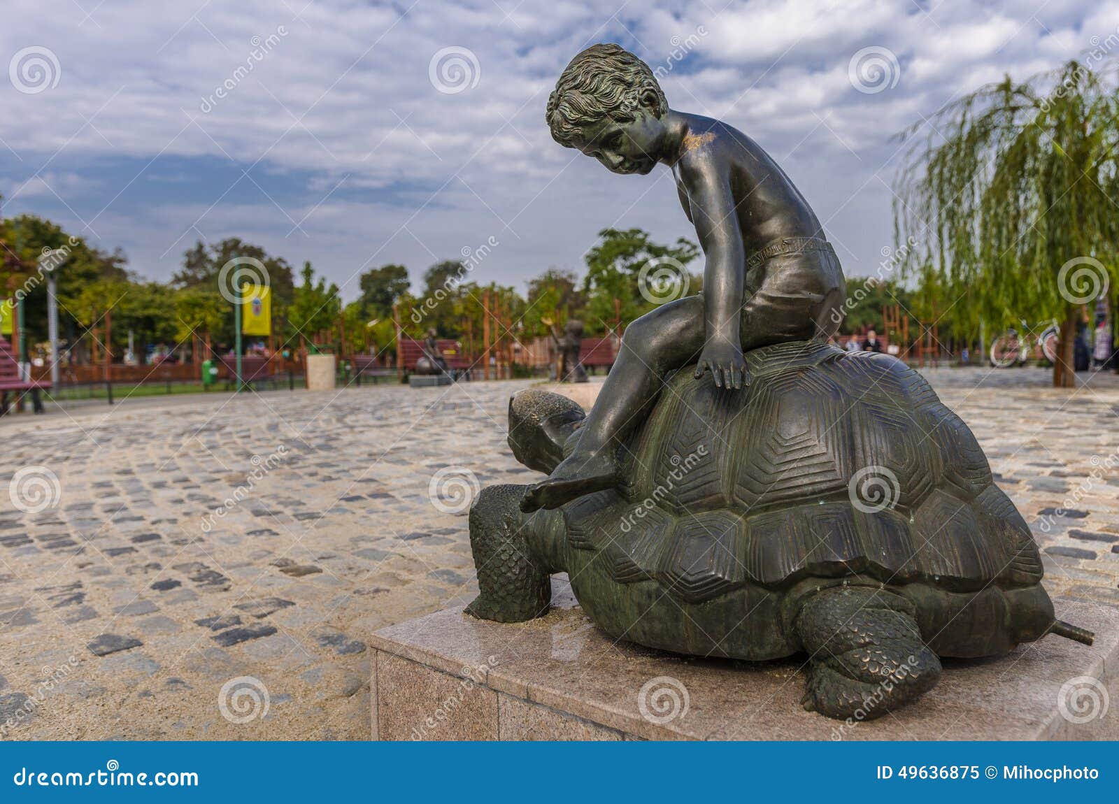 Child riding a huge turtle stock image. Image of architecture - 49636875