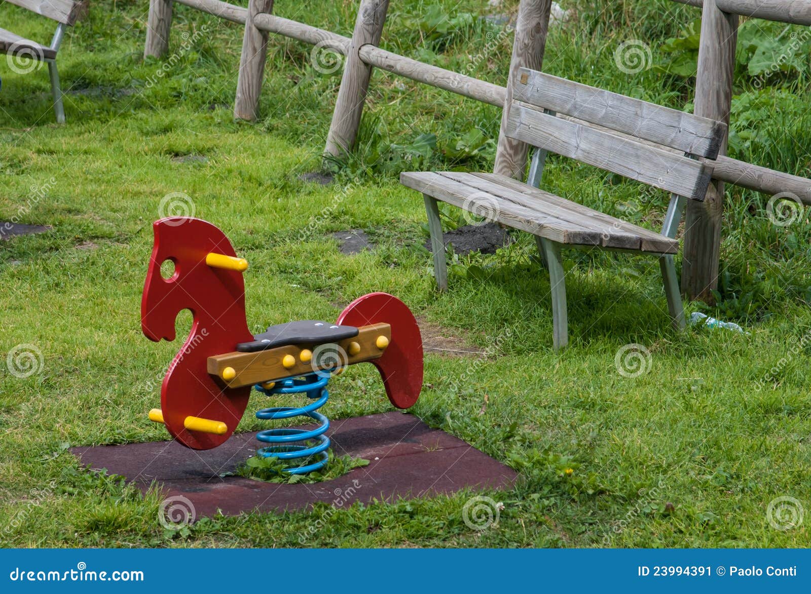 Child Riding Rocking Horse in Playground Stock Image - Image of ...
