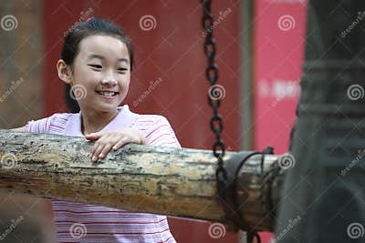Child ringing bells stock image. Image of china, beautiful - 23741025