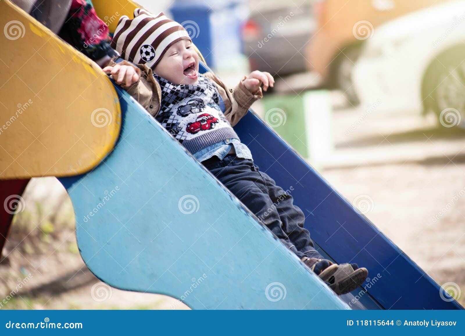 The Child Rolls Down the Hill Stock Photo - Image of nice, look: 118115644 The Child Rolls Down the Hill Stock Photo - Image of nice, look: 118115644