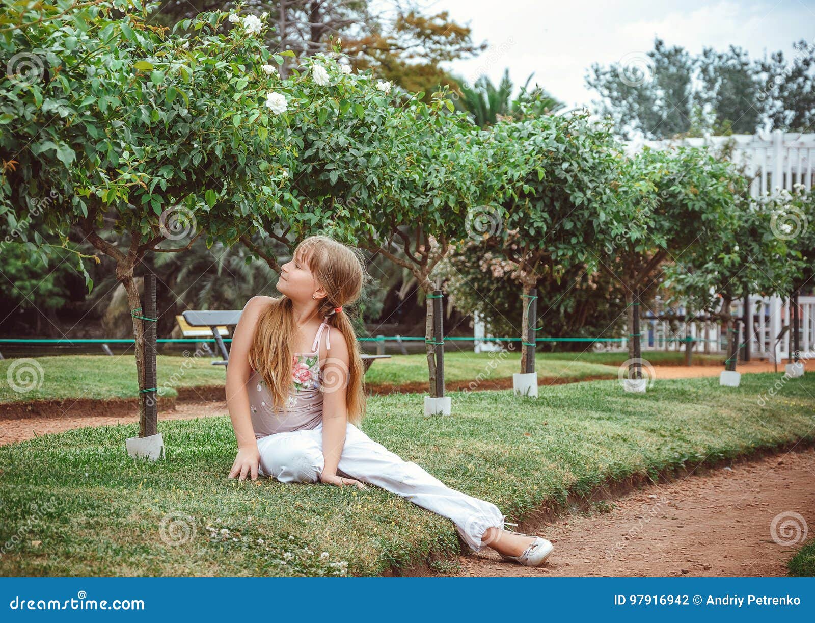Child with Rose Flower in Spring Garden Stock Photo - Image of leaf ...