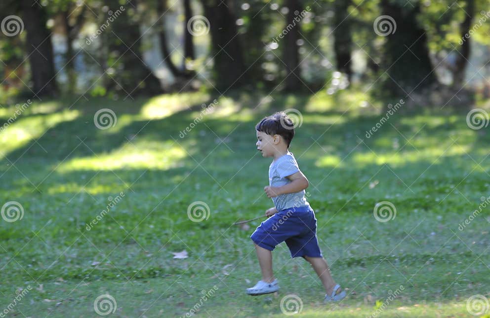 Child running stock photo. Image of shirt, trunk, running - 22908330
