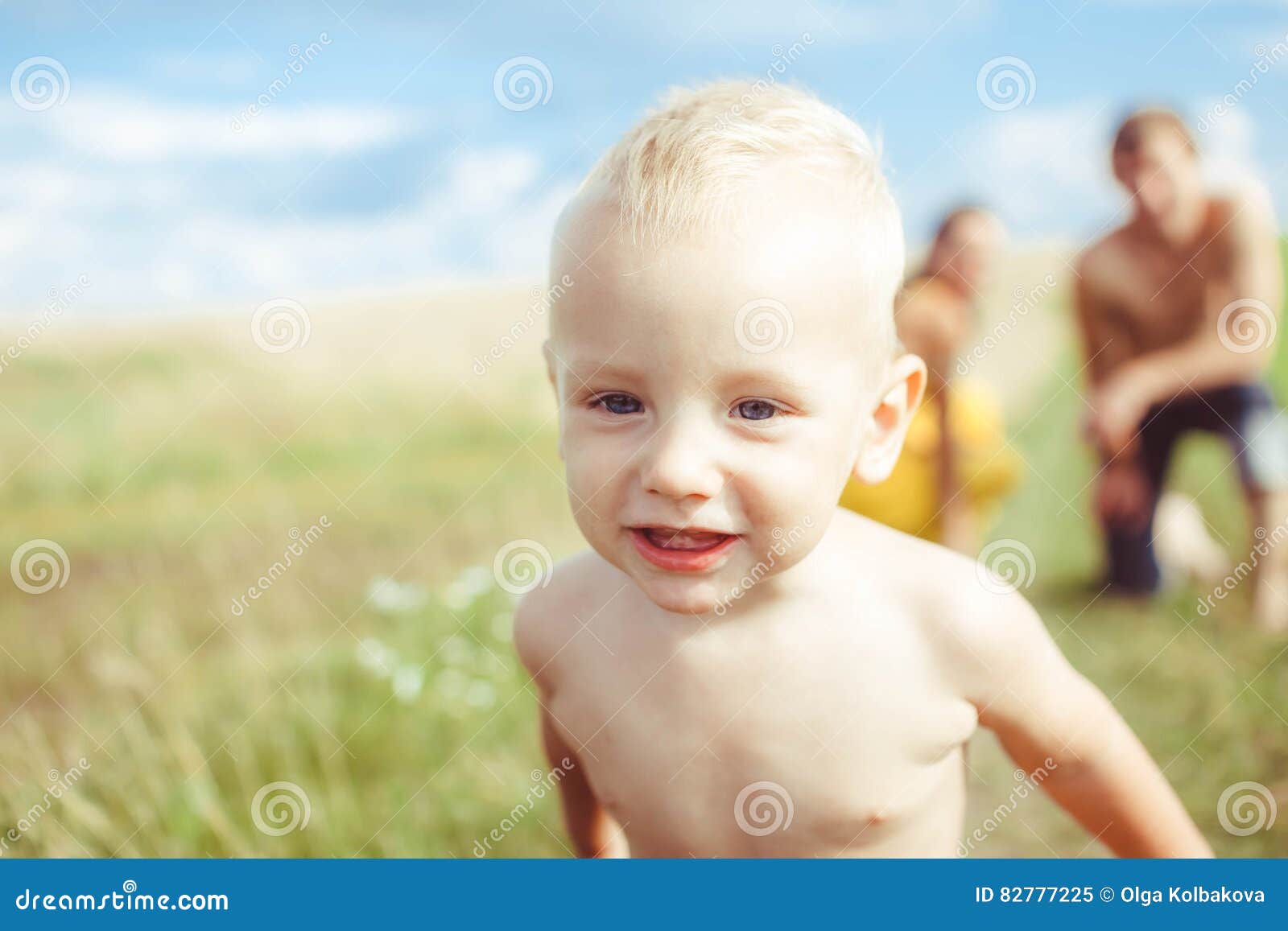 Child running in a field stock image. Image of male, family - 82777225
