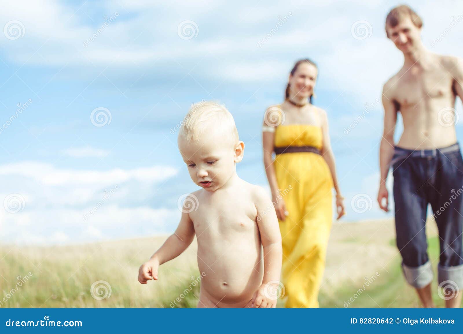 Child running in a field stock photo. Image of merry - 82820642