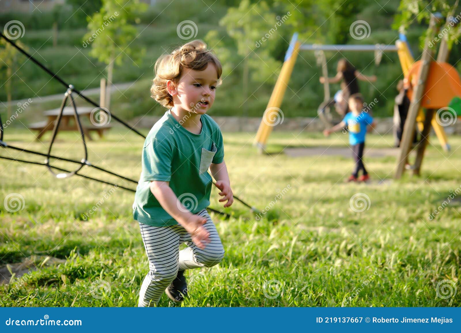 Child Running on a Playground Stock Image - Image of enjoyment, emotion ...