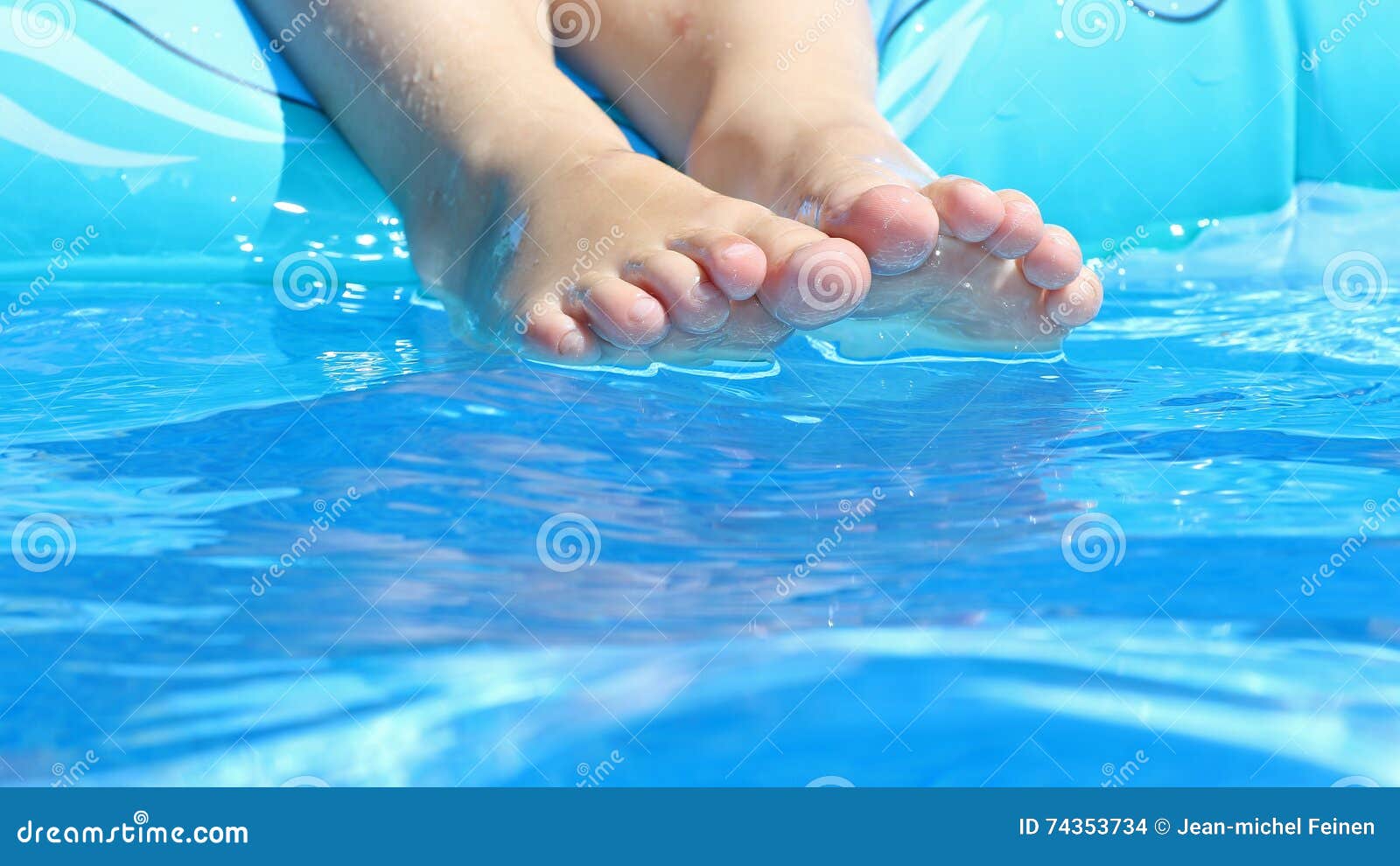 Child S Feet in Water in Clear Blue Water Stock Photo - Image of ...