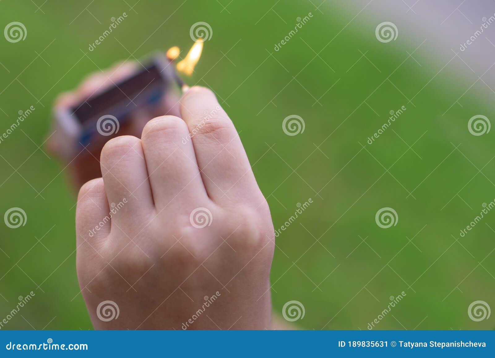 Child`s Hand with Blurred Burning Match and Matchbox Stock Image ...