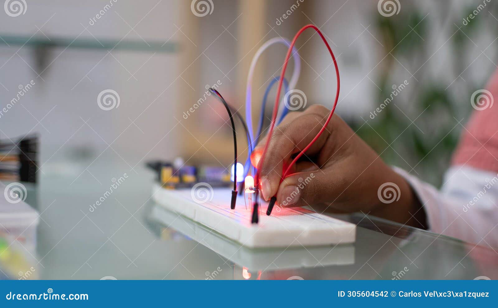 Child S Hand Making Electrical Connections To Turn on Led Lights Stock ...