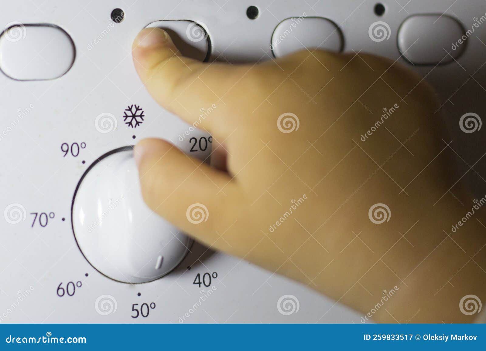 A Child& X27;s Hand Presses a Button on a Washing Machine Stock Image ...