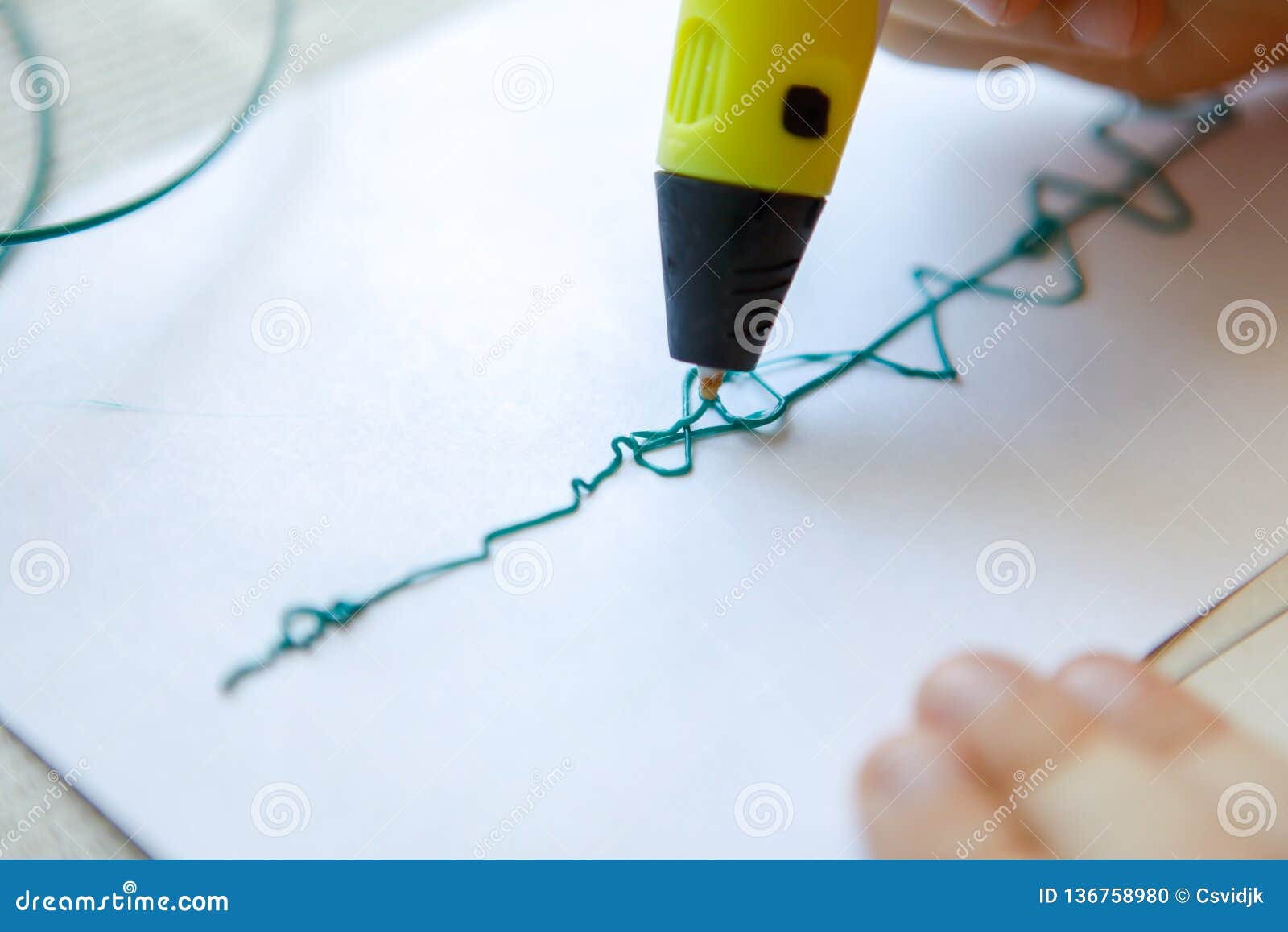 3D pen at work, close-up stock photo. Image of yellow - 136758980