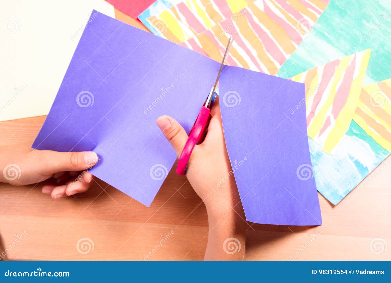 Child`s Hands Cutting Colored Paper with Scissors Stock Photo - Image ...