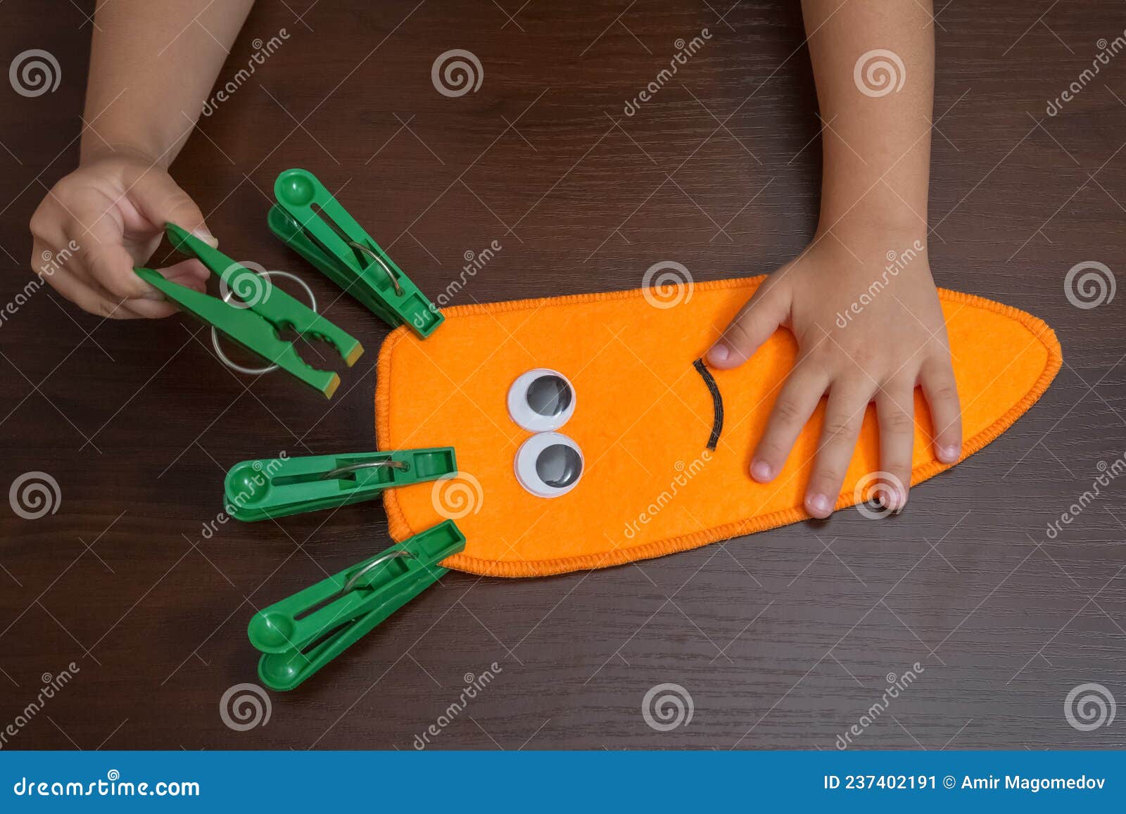 The Child`s Hands. Development of Fine Motor Skills through Games Stock ...