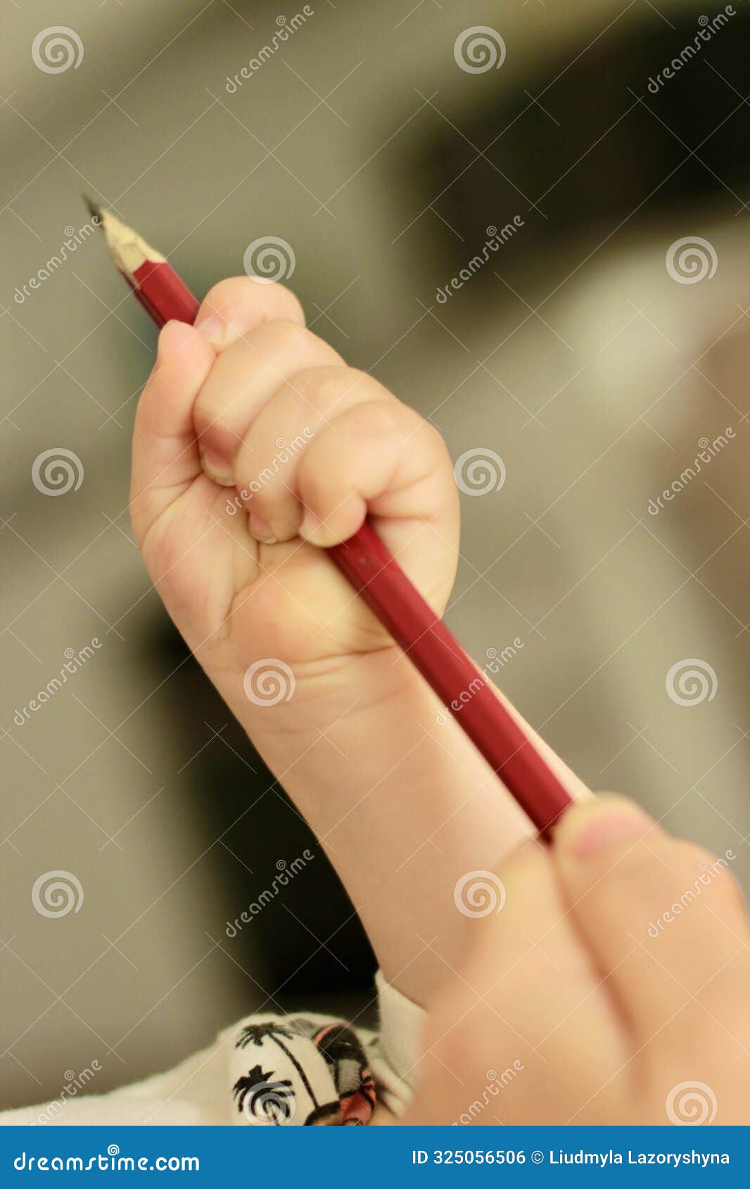 A Child S Small Hand Takes a Pencil from Another Hand Stock Photo ...