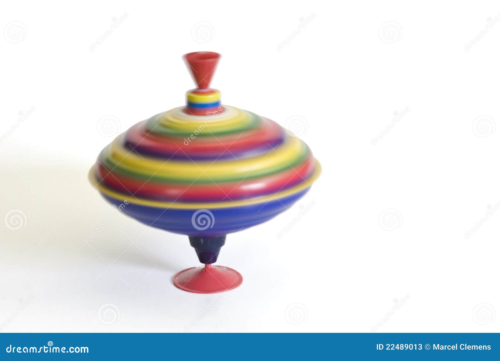 Child S Tin Humming Top in Motion on White. Stock Image - Image of ...
